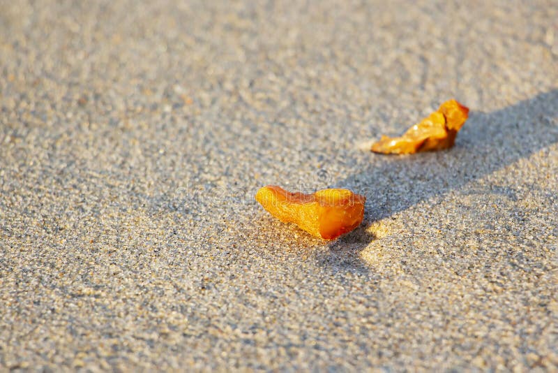 Amber on Fine Sand, Beautiful Piece of Amber from the Sand. Stock Photo ...