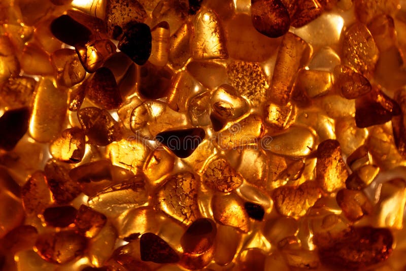 Amber Grains with Backlight Illumination Stock Photo - Image of ...