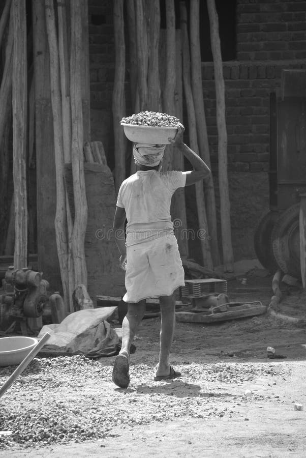 Construction Labour Working at Construction Site Carrying Brick Cement ...