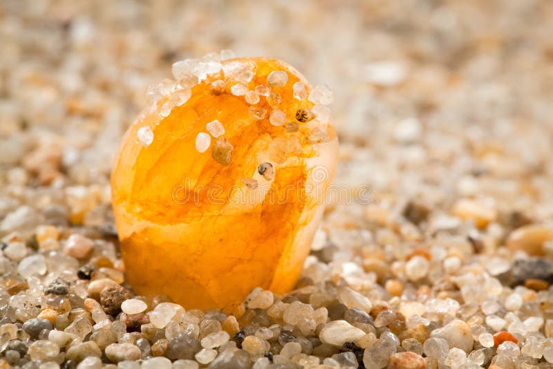 Amber on sand stock photo. Image of treasure, concept - 30757508