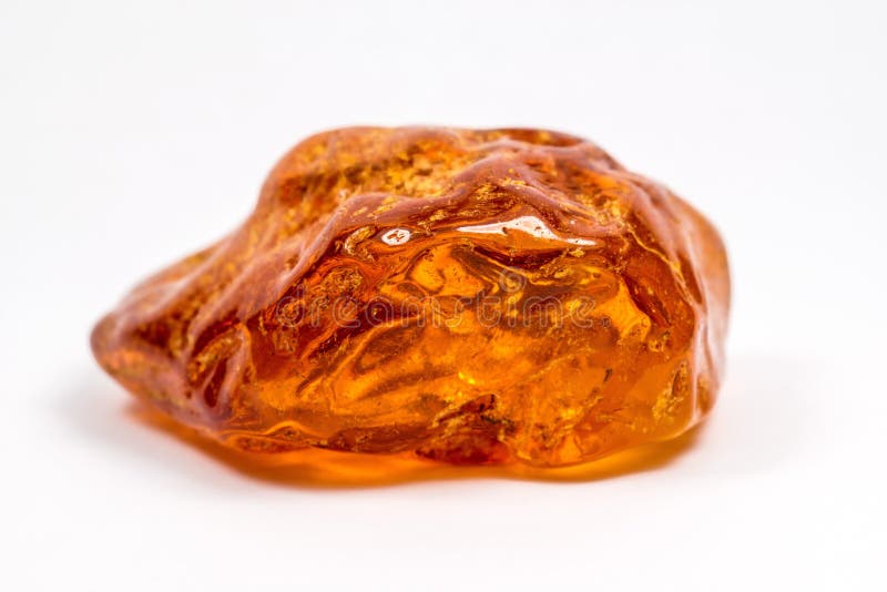 Amber stone in a closeup stock image. Image of jewelry - 260936405