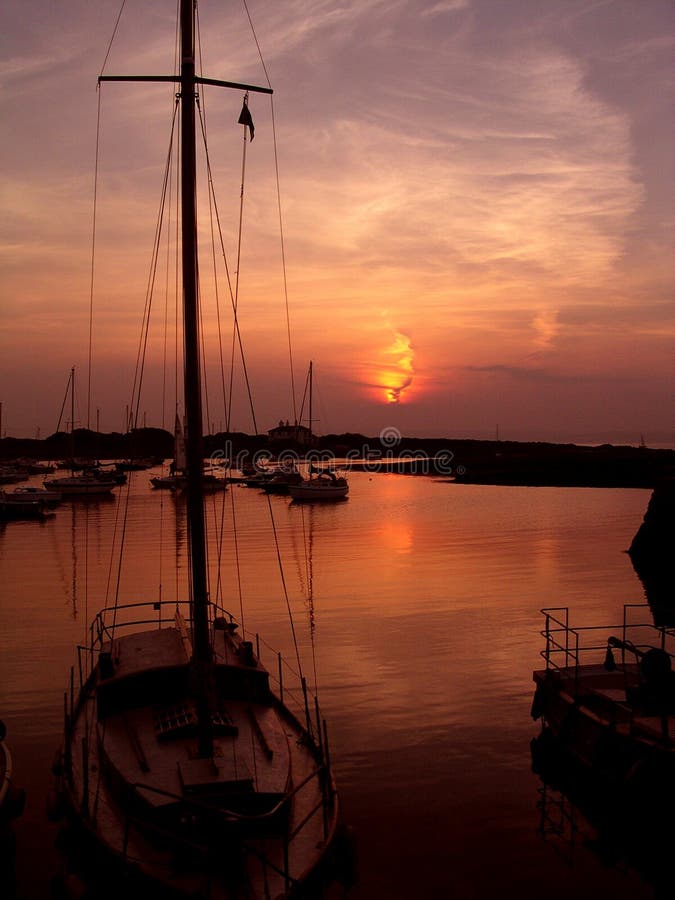 Amber sunset stock photo. Image of ireland, sepia, reflection - 18902