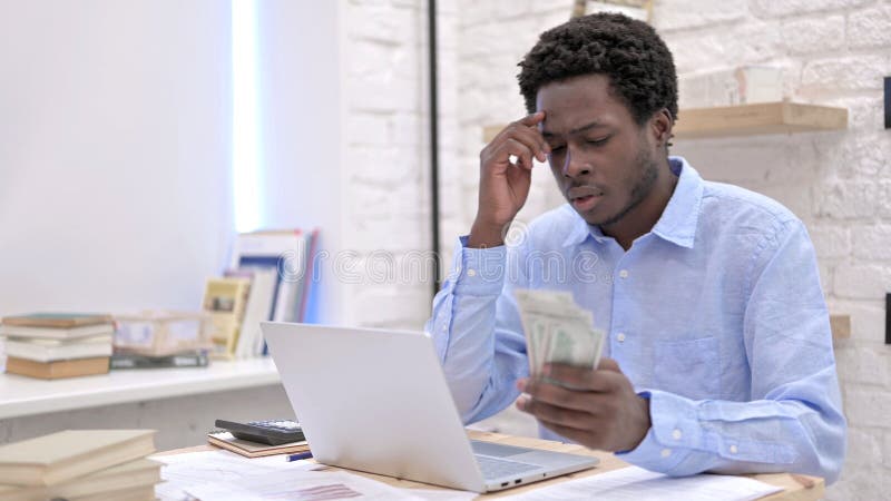 Ambitious African Man Counting Money and Thinking Stock Photo - Image ...