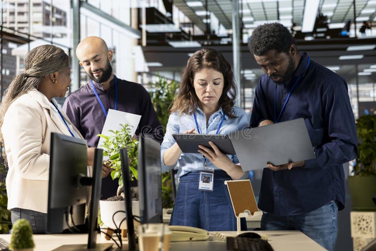 Ambitious Work Team Collaborates on a Financial Planning Project in an ...