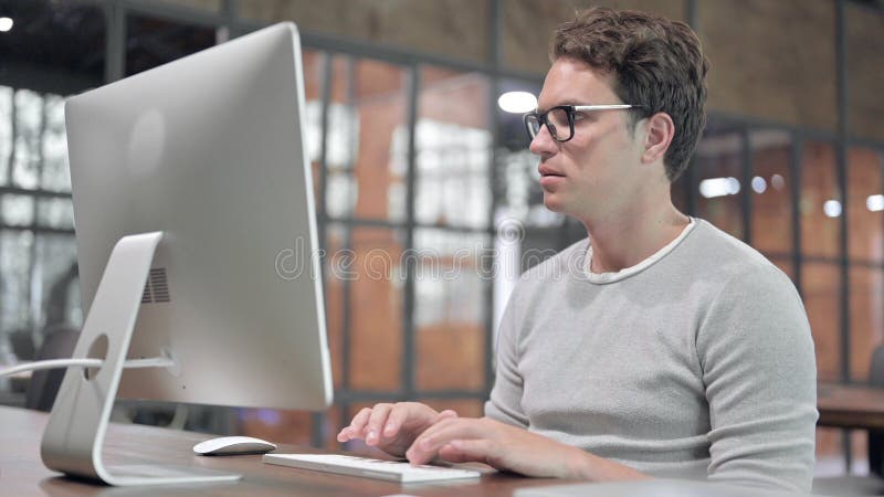 Ambitious Young Guy Working on Computer Stock Image - Image of ...