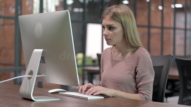 Ambitious Young Woman Working on Computer Stock Image - Image of ...