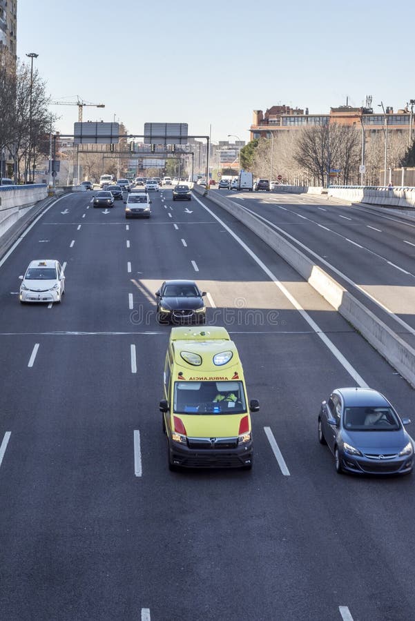 An Ambulance Driving with Warning Lights Editorial Photography - Image ...
