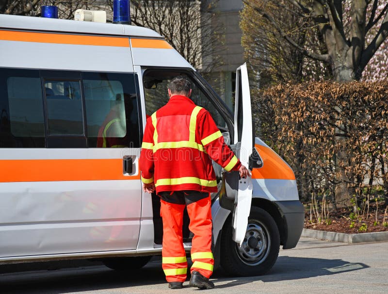 Ambulance and Medic on the Street Stock Photo - Image of street, land ...