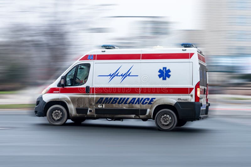 Ambulance in Motion, Side View Highlighting Urgency and Critical ...