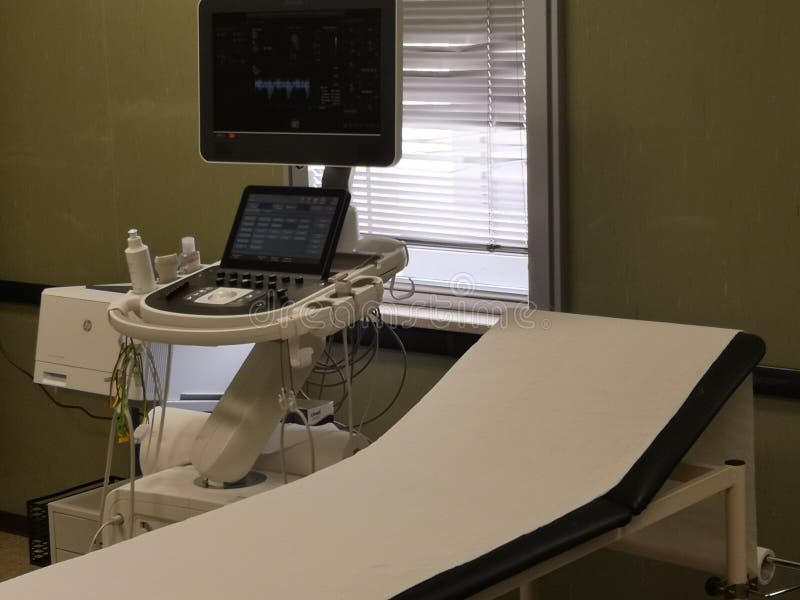Ambulatory Hospital with Cot and Examination Machine Stock Image ...