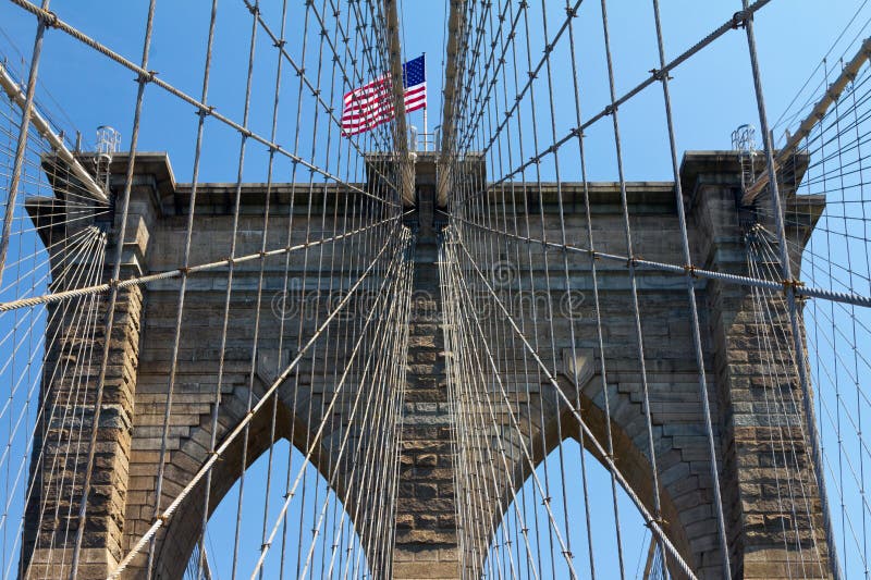 America Flag Flying Over the Brooklyn Bridge Stock Photo - Image of ...