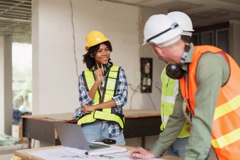 American African Foreman Builder Woman at Construction Site. Foreman ...