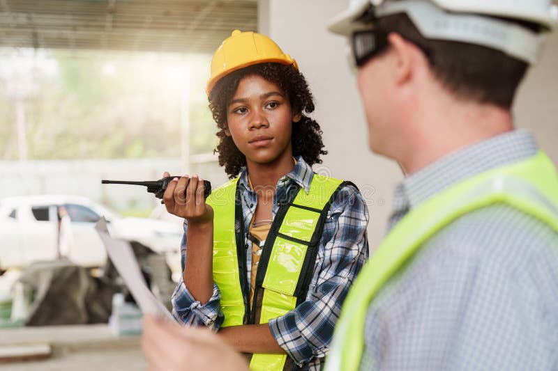 American African Foreman Builder Woman at Construction Site. Foreman ...