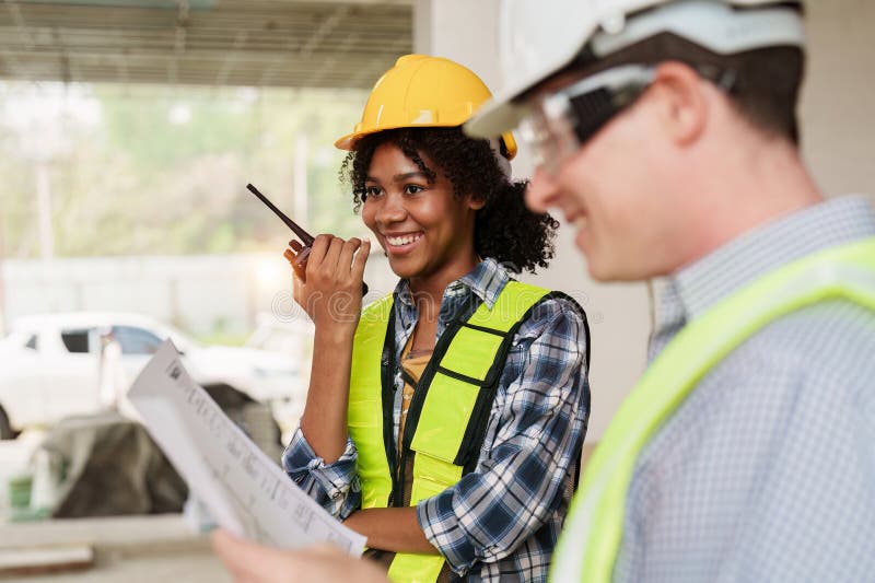 American African Foreman Builder Woman at Construction Site. Foreman ...