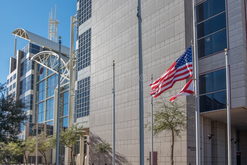 American and Alabama Flags Fly in Front of the Mobile County Courthouse ...