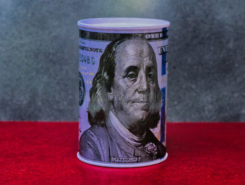 An American Dollar Coin Bank on a Red Surface. Stock Photo - Image of ...