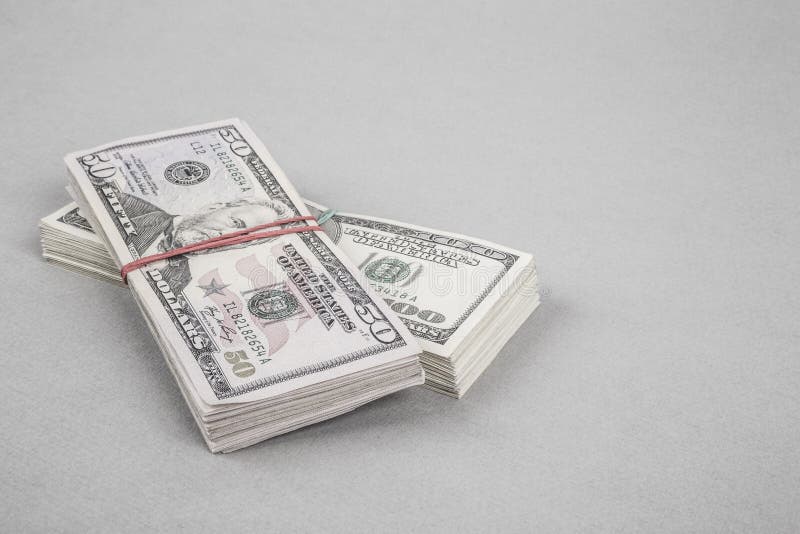 American Dollar Stacks on Grey Stock Photo - Image of financial, cash ...