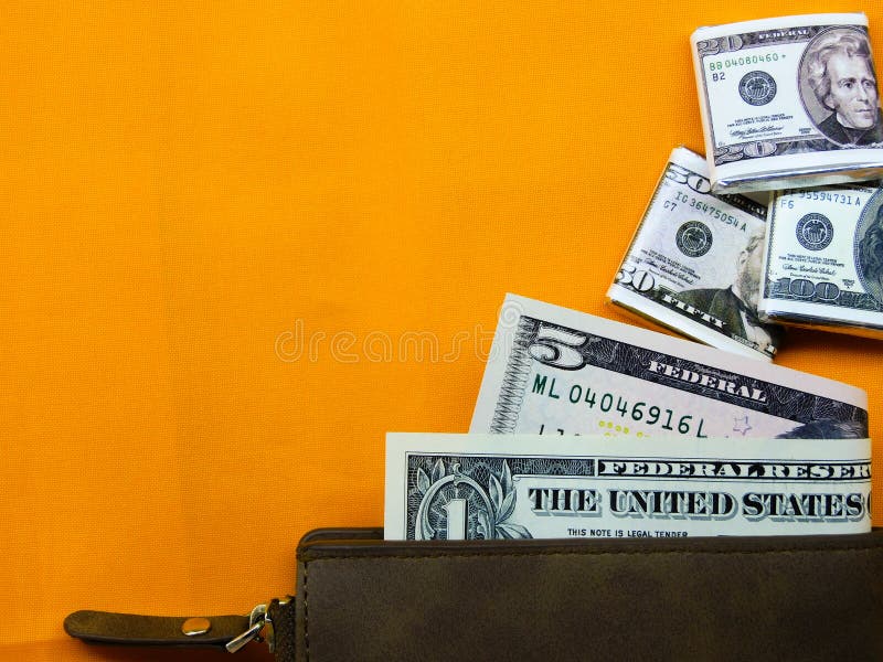 American Dollars on Orange Bright Background Stock Photo - Image of ...