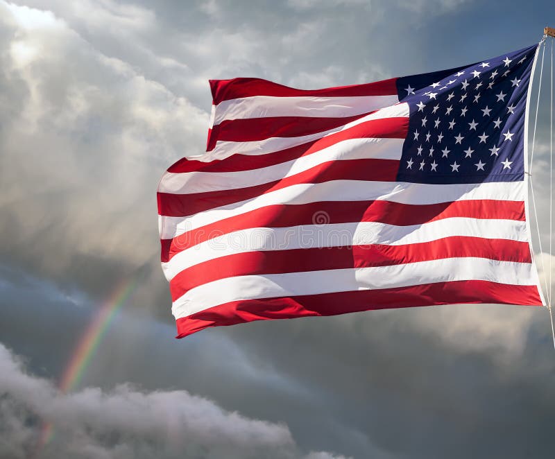 American Flag Against a Cloudy Sky with a Rainbow Stock Image - Image ...