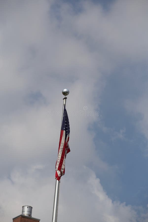 American Flag with Blue Sky on the Back Editorial Photography - Image ...