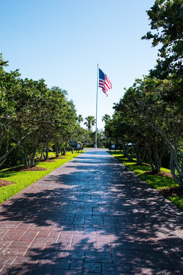 American Flag on a Brick Pathway Editorial Photography - Image of ...