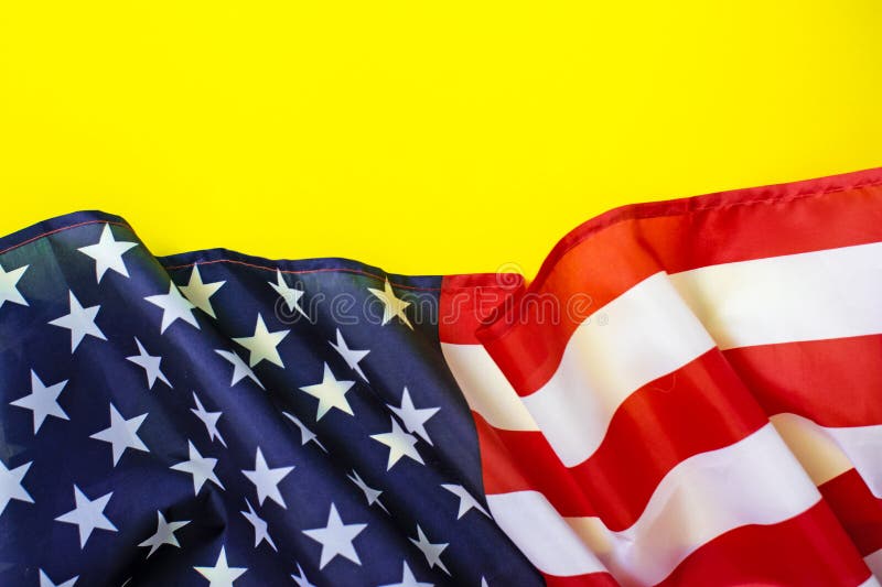 American Flag On A Bright Yellow Background Stock Photo - Image of ...