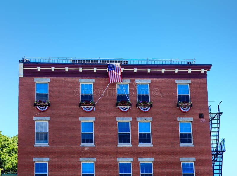 American Flag and Bunting on Old Brick Stock Image - Image of wall ...