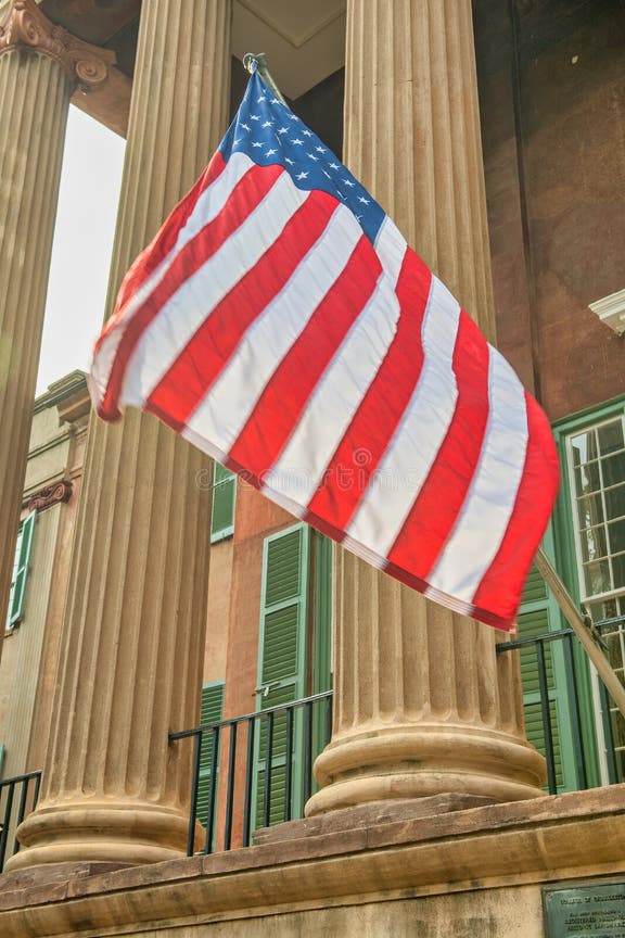 American Flag in Front of Monumental Building Stock Photo - Image of columbia, flag: 244315834