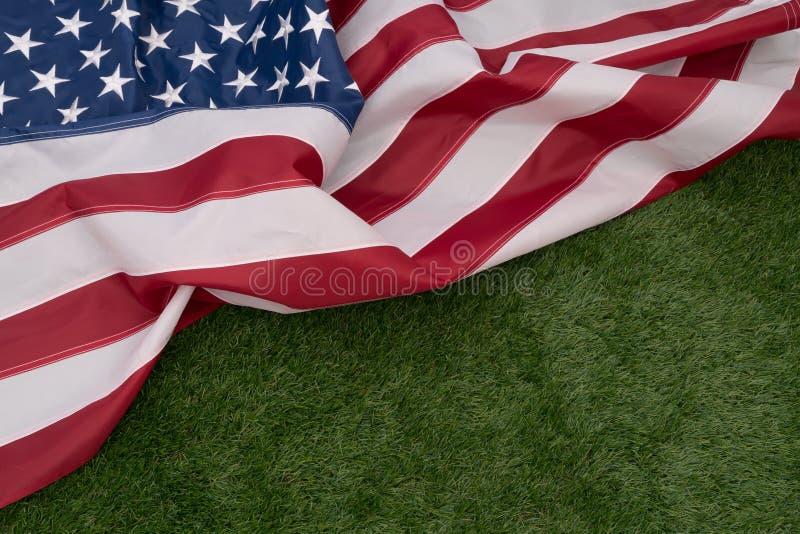 .American Flag on Green Grass Stock Photo - Image of stripes, nation ...