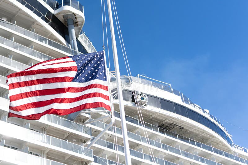 American Flag at Half Mast in Front of Cruise Ship Stock Photo - Image ...
