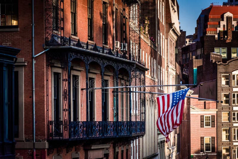 American Flag Hanging from a Building in Boston, Massachusetts. Stock ...