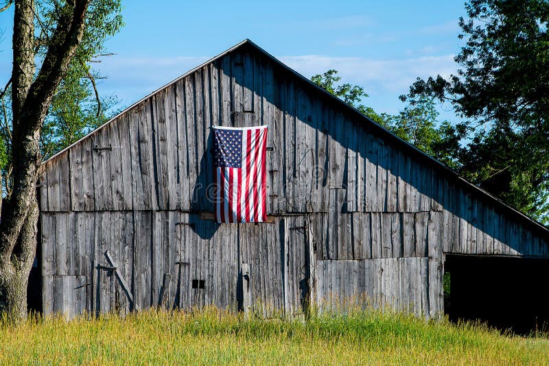 Red Barn with American Flag Stock Photo - Image of structure, table ...