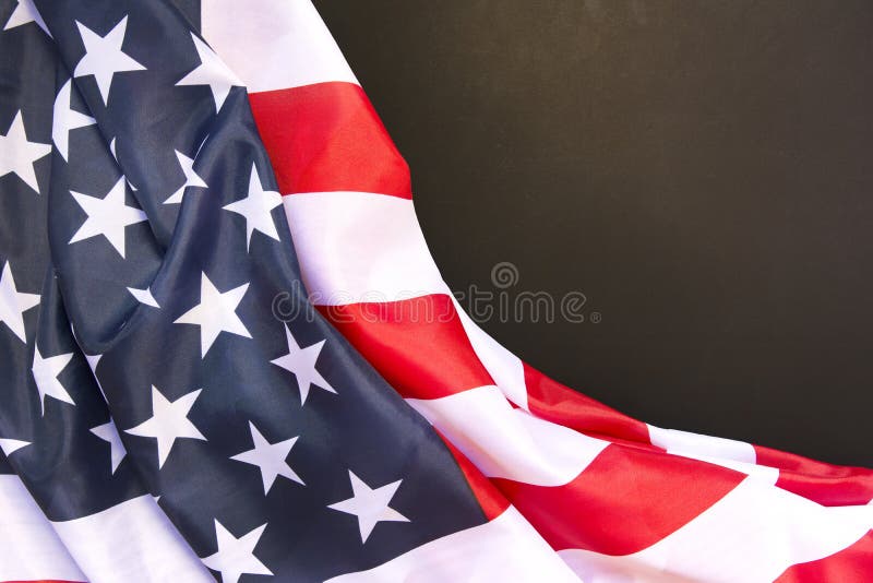 American Flag on Plain Back Background with Space for Text Stock Photo ...
