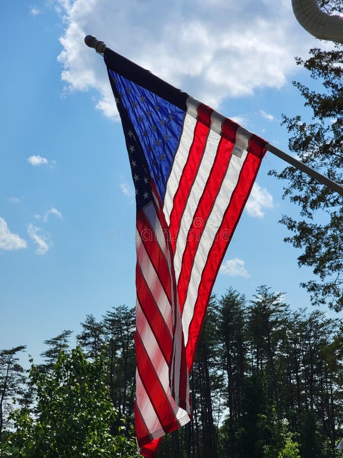 American Flag Proudly Flying Stock Photo - Image of holiday, flag ...