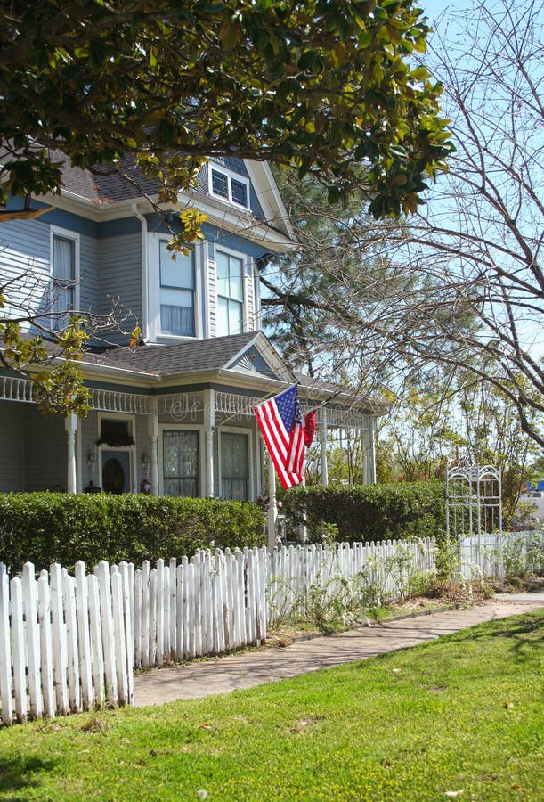 American Flag on Texas Rural Victorian Home Stock Image - Image of ...