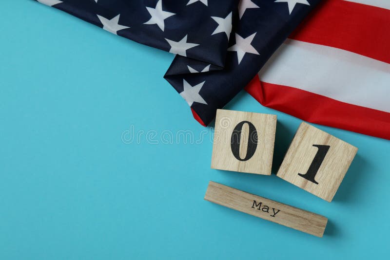 American Flag and Wood Calendar with 1 May on Blue Background Stock ...