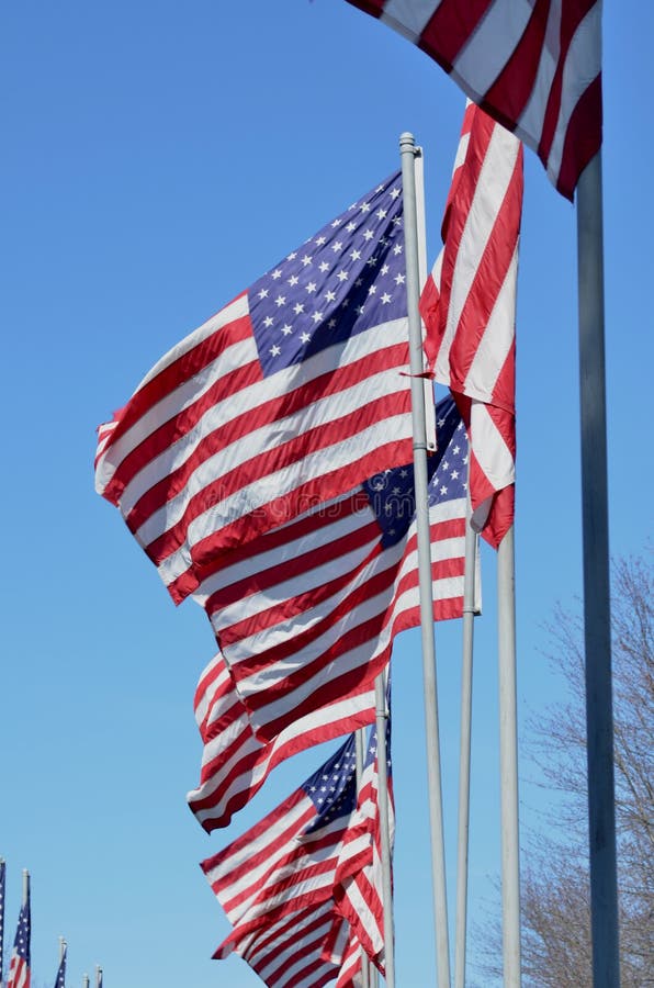 American Flags Blowing in Wind Stock Image - Image of close, details ...