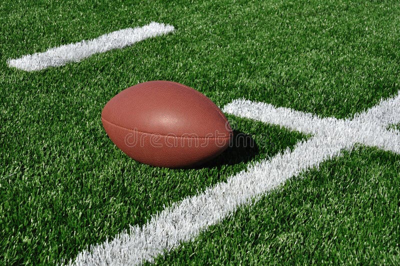American Football on Artificial Turf Stock Image - Image of brown ...