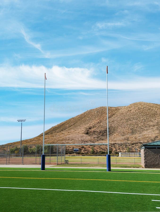 American Football Goal Posts with Hill and Blue Sky. Stock Photo ...