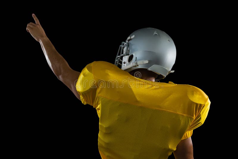 American Football Player Pointing Upwards Stock Photo - Image of ...