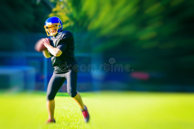 American Football Player Passing the Ball Stock Image - Image of ...