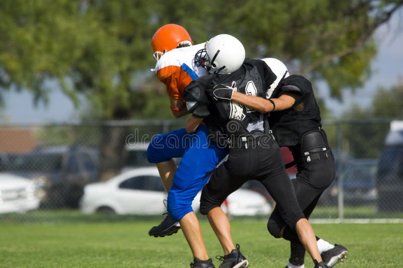 American Youth Football Tackle Editorial Photography - Image of line ...