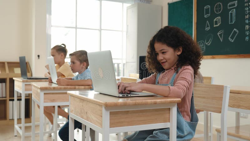 American Girl Learning about Prompt while Student Sitting at Class ...