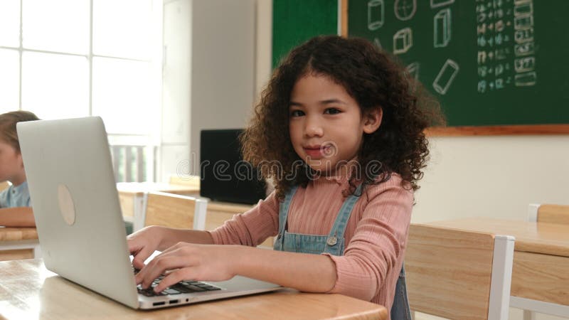 American Girl Learning about Prompt while Student Sitting at Class ...