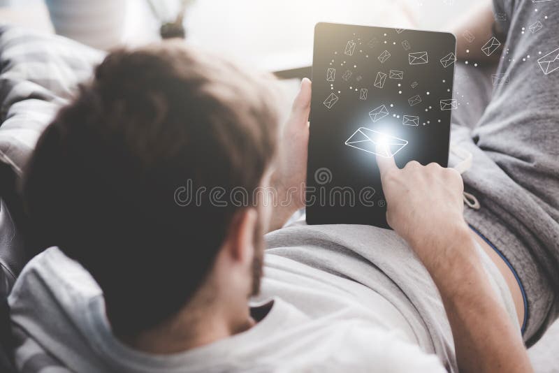 American Man Check and Sending Message with Email in a Tablet. Stock ...