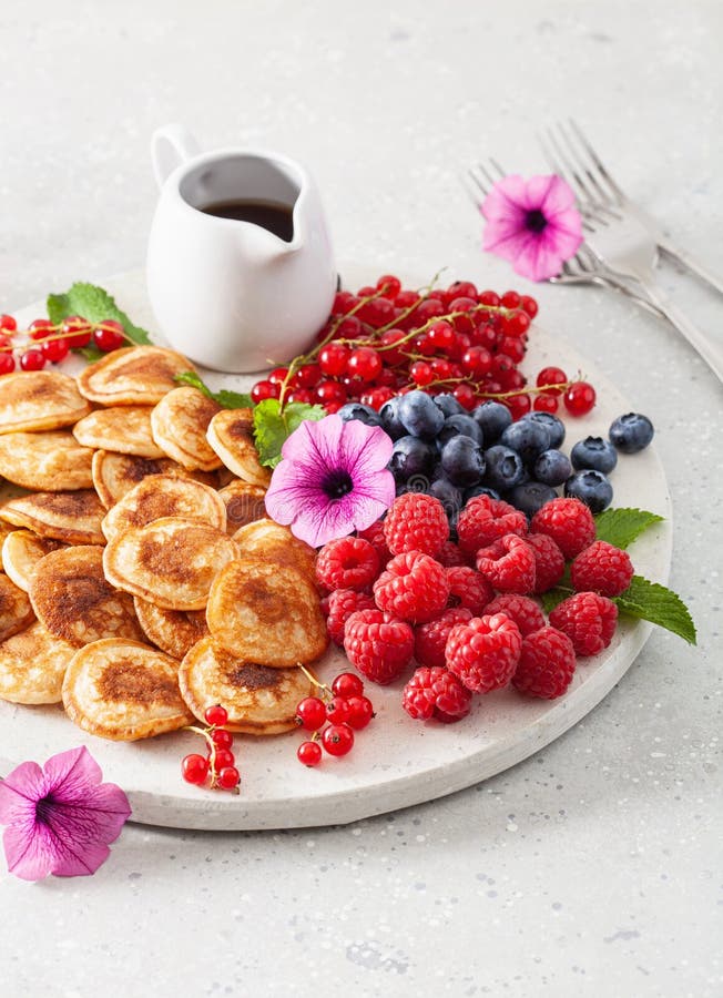 American Mini Pancake Board with Berries and Maple Syrup Stock Image ...