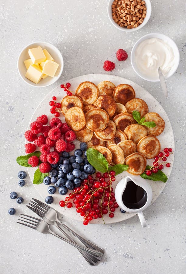 American Mini Pancake Board with Berries and Maple Syrup Stock Photo ...