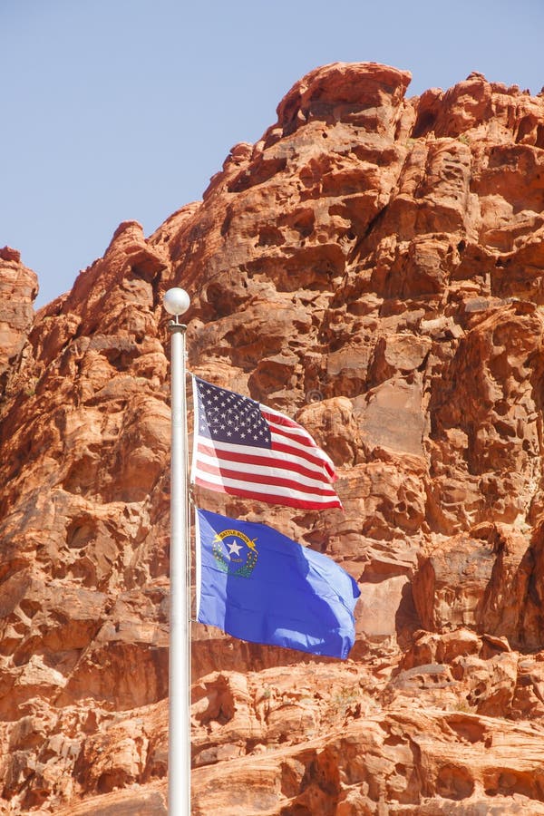 American and Nevada Flag in Front of Red Rock Stock Photo - Image of ...