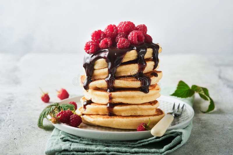 American Pancakes. Stack Pancakes with Fresh Raspberry with Chocolate ...