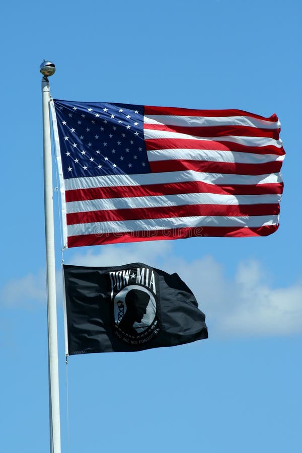 American and POW Flags Against a Blue Sky Editorial Stock Image - Image ...